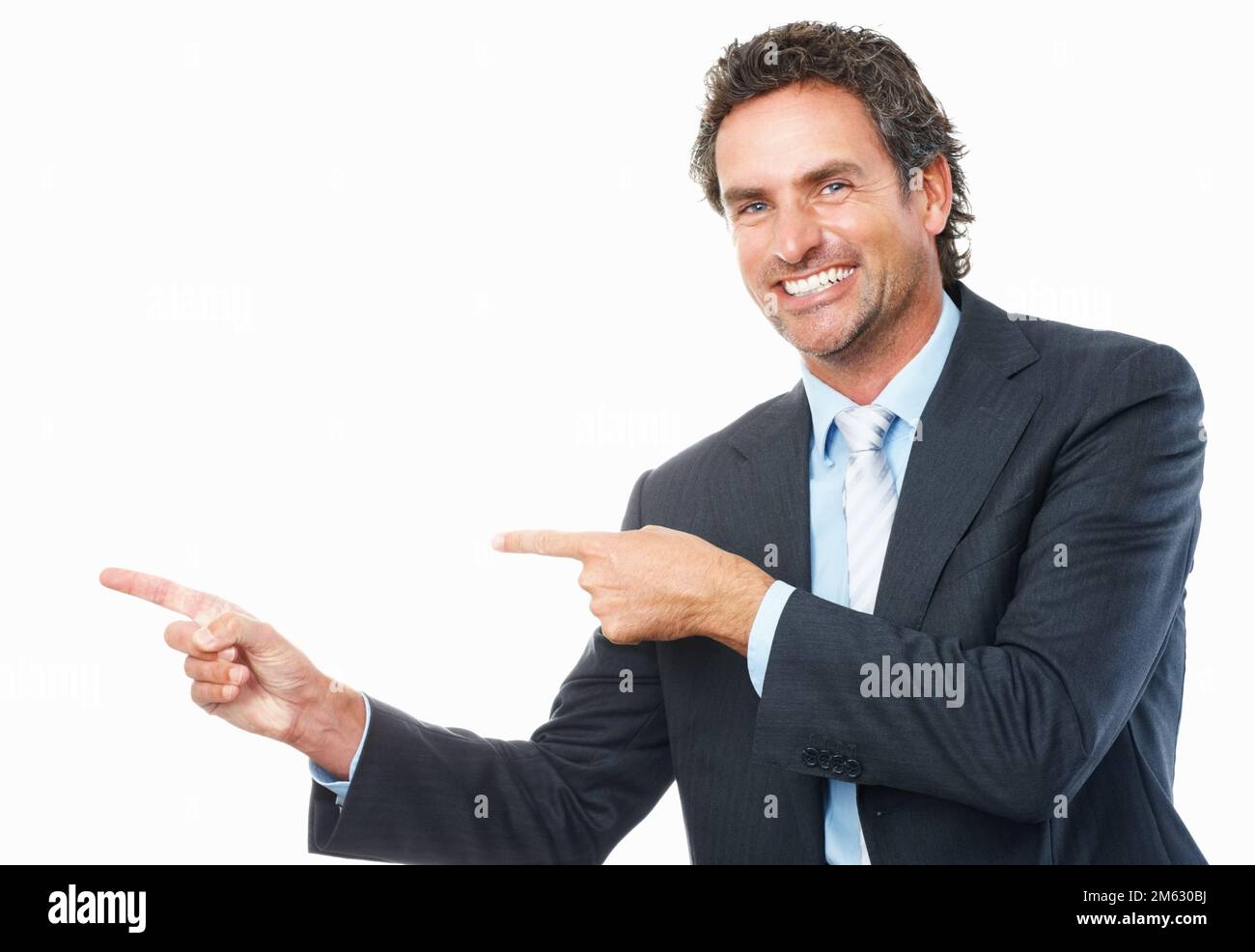 Business man pointing with finger. Portrait of handsome mature business ...