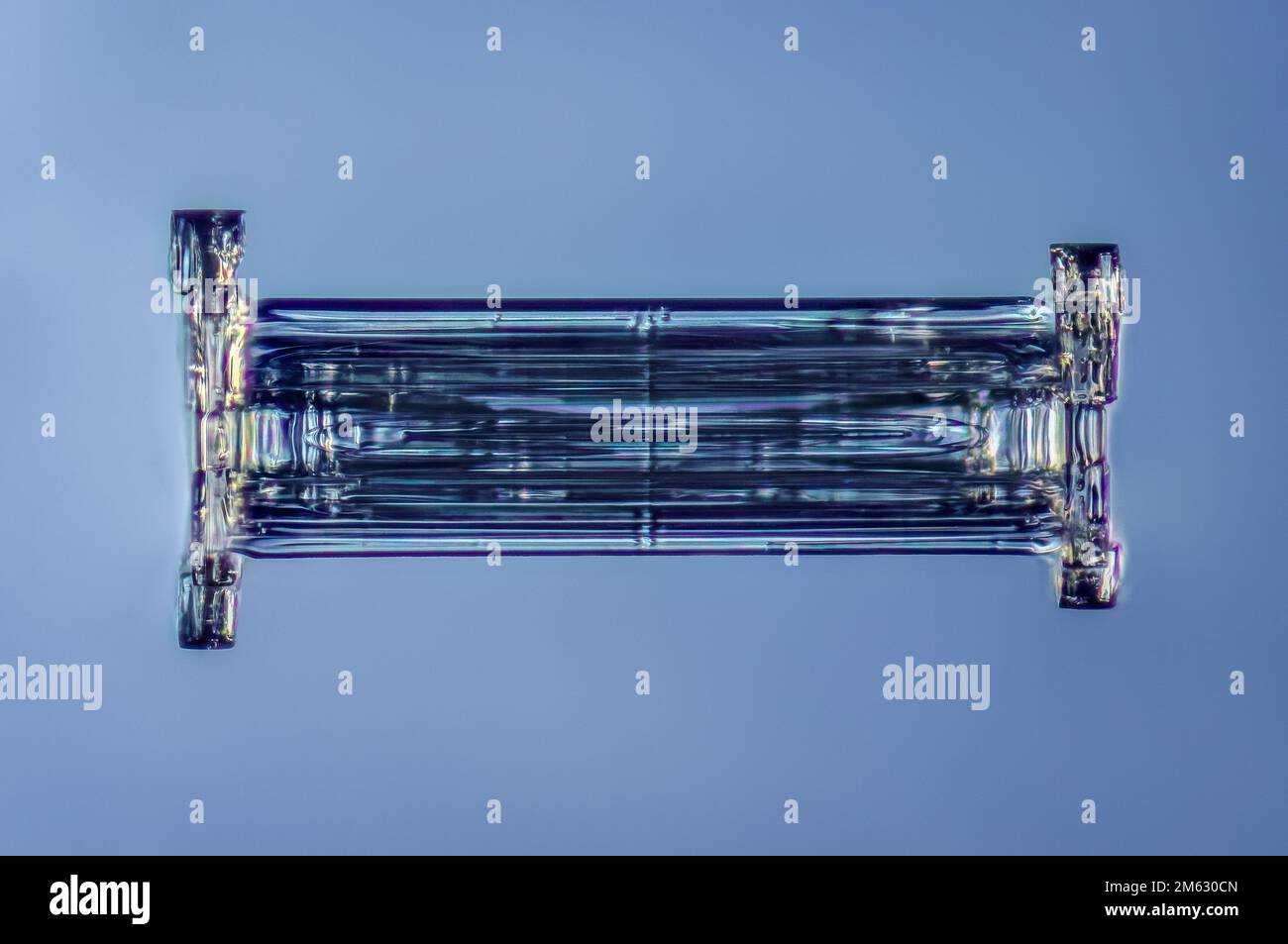 Real column snowflake at high magnification. Macro photo of small ...