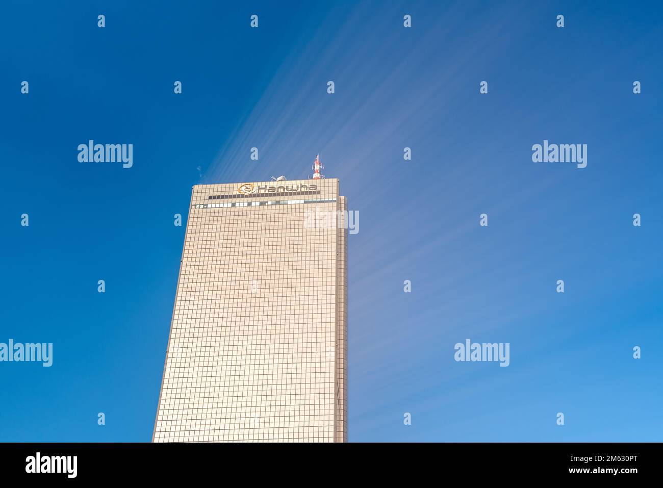 Sunlight reflecting from the gold-tinted glass of the 63 Square ...