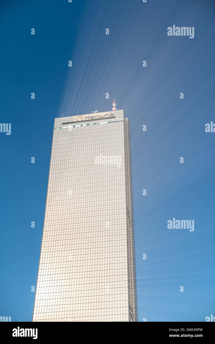 Sunlight reflecting from the gold-tinted glass of the 63 Square ...