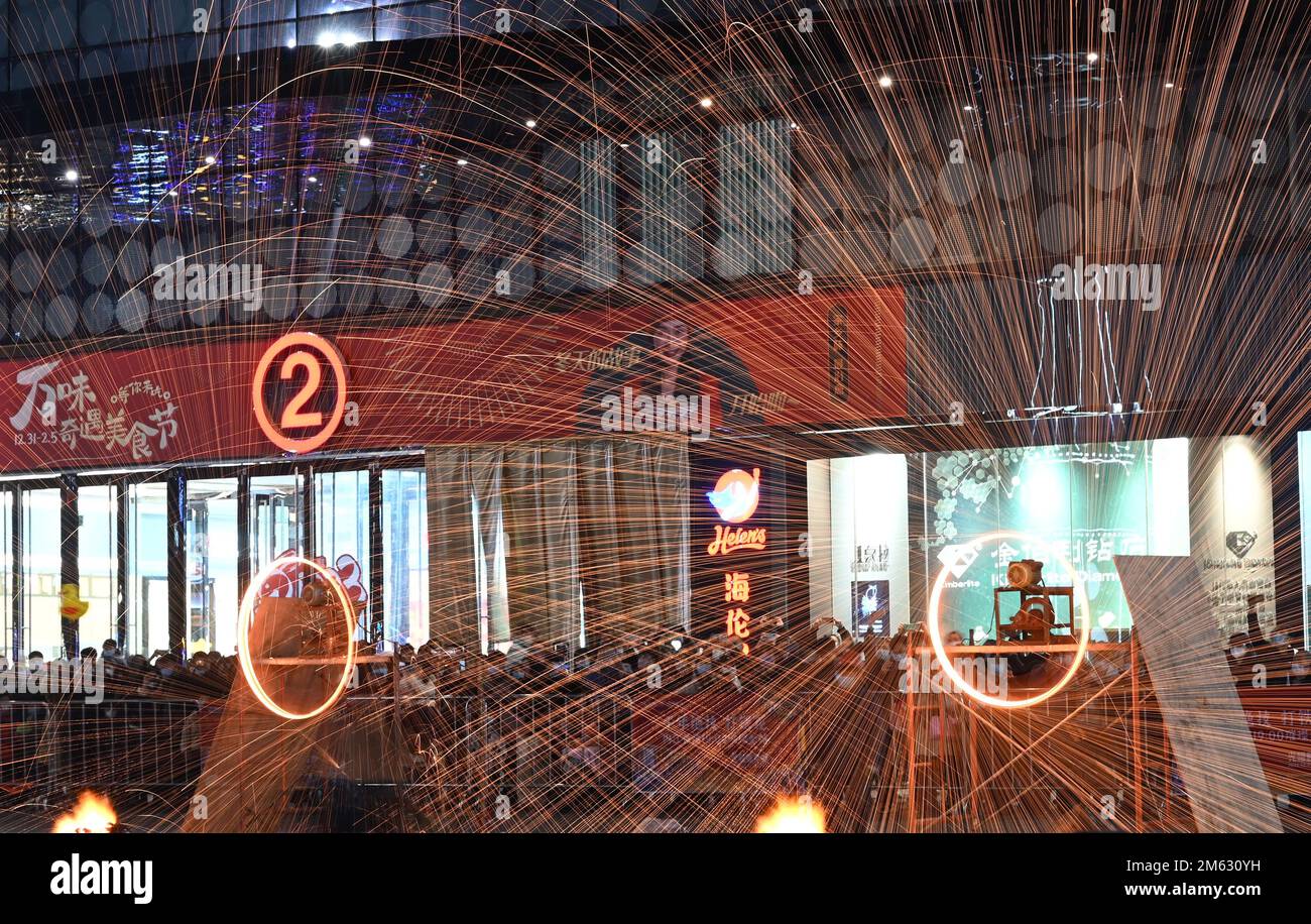 Aerial photo shows people watching the "Iron Flower" performance of an ...