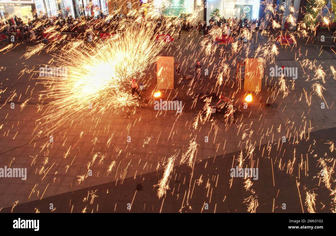 Aerial photo shows people watching the "Iron Flower" performance of an ...