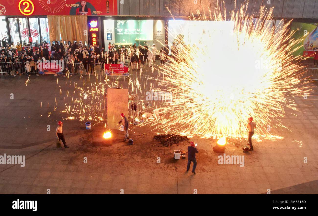 Aerial photo shows people watching the "Iron Flower" performance of an ...
