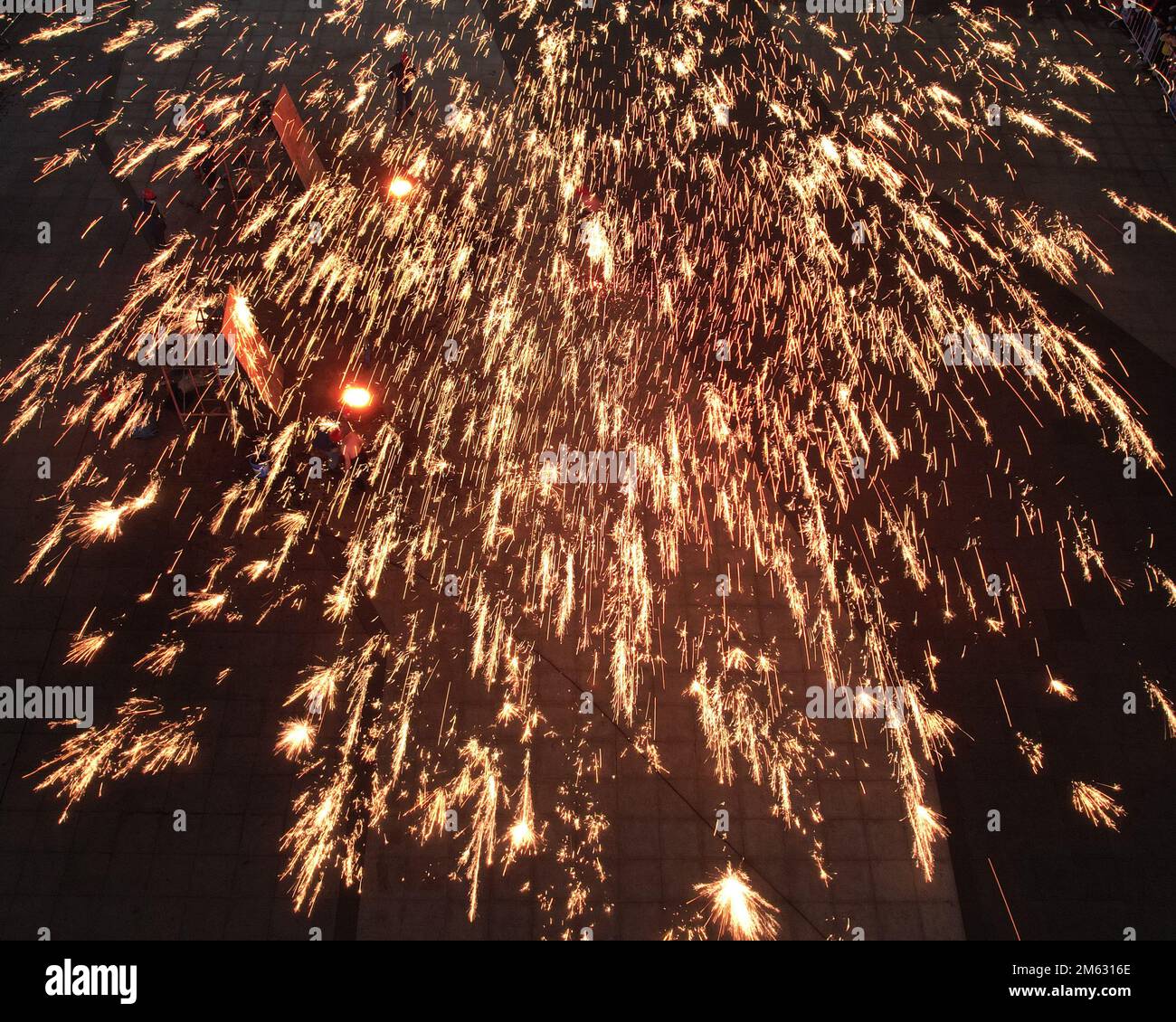 Aerial photo shows people watching the "Iron Flower" performance of an ...