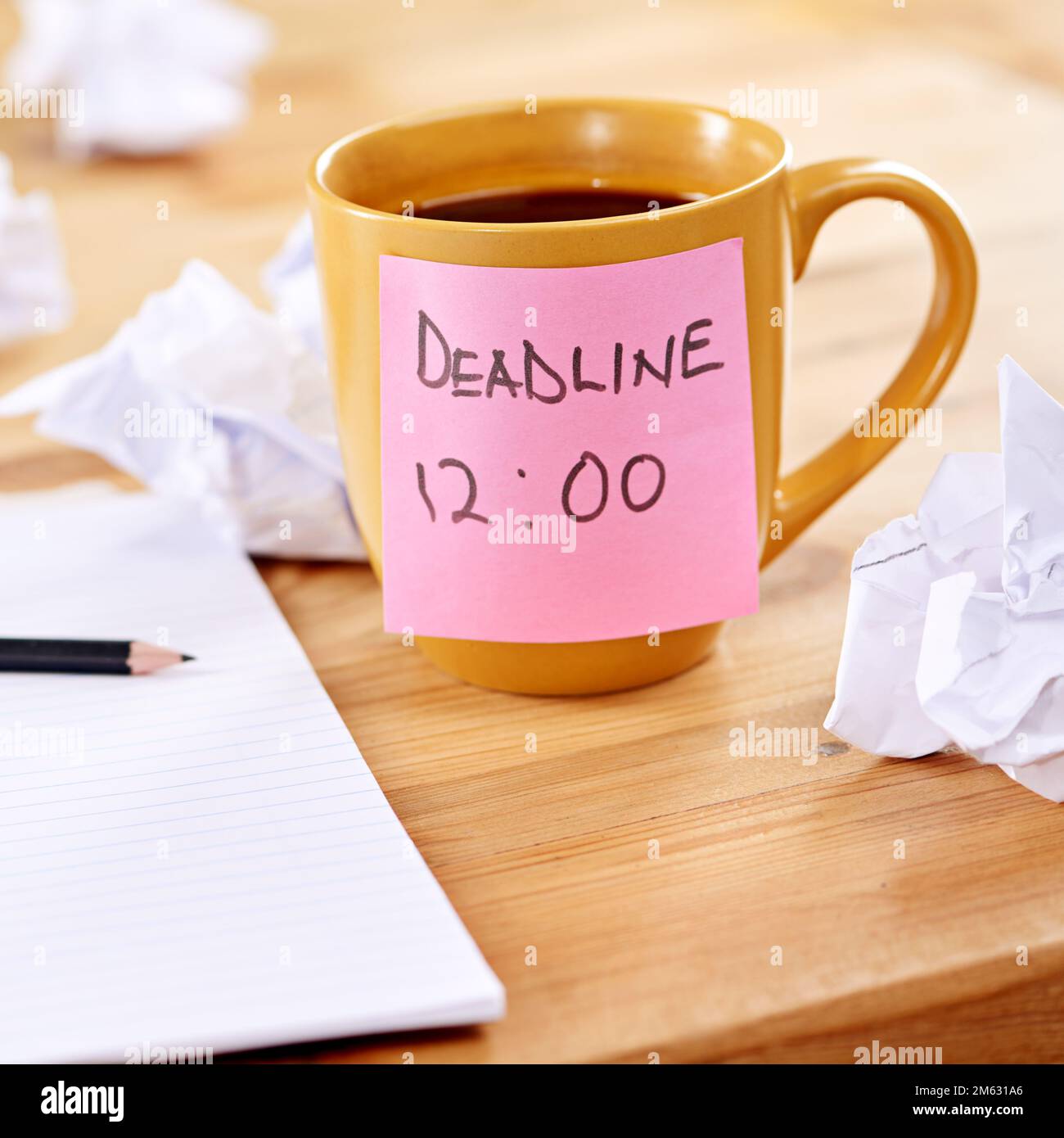 Cant think of anything. a broken pencil and notepad surrounded by ...