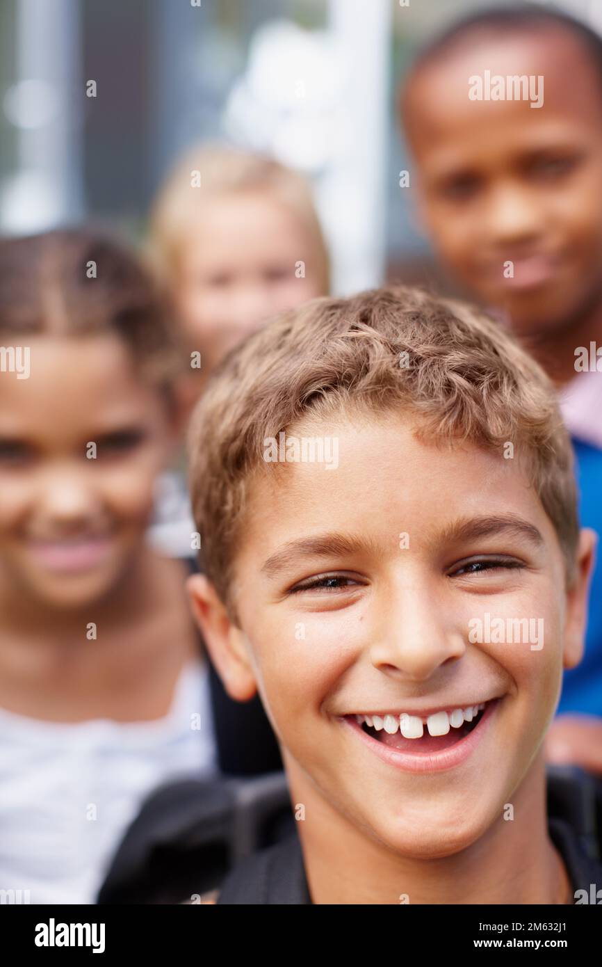 Feeling happy and confident. Closeup of a laughing little boy with ...