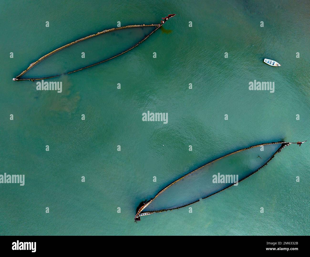 Shipwrecks in a Bay Mauritius Port Louis. Corroded Iron Ship body ...