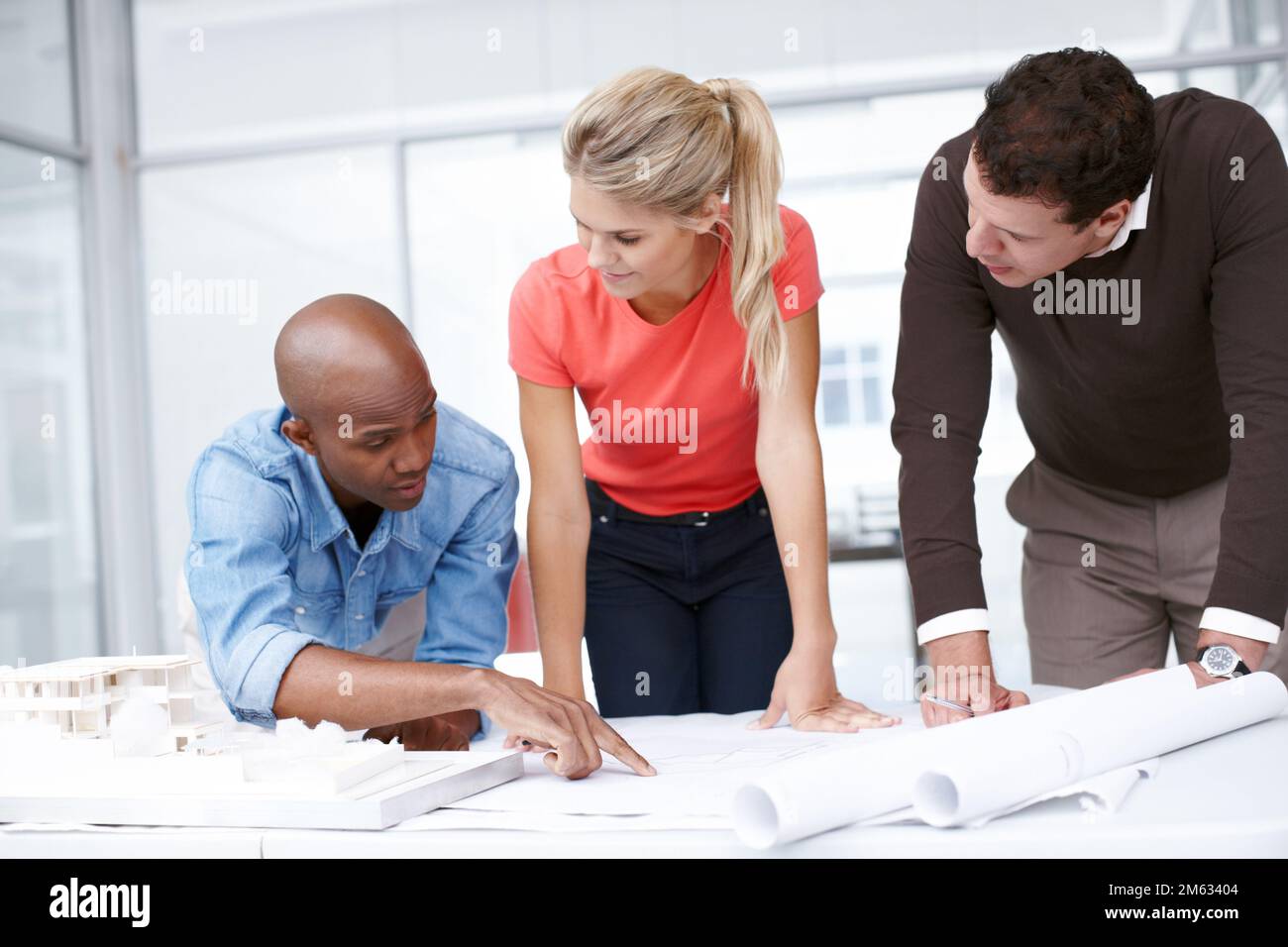 He always has brilliant ideas. A group of architects working together ...