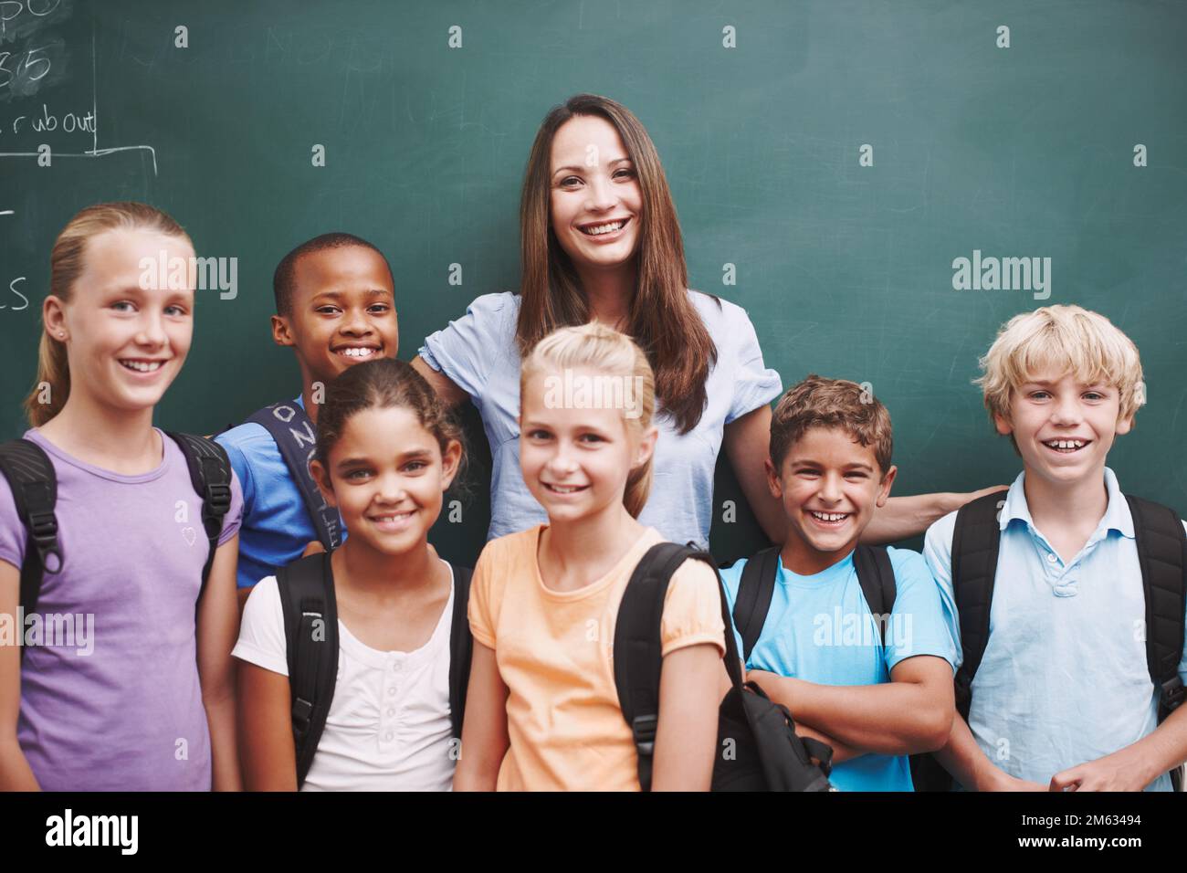 She strives to make her classroom a fun place. A happy group of ...