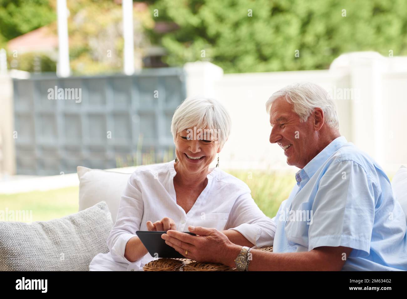 Look, our grandson took his first steps today. a senior couple using a ...