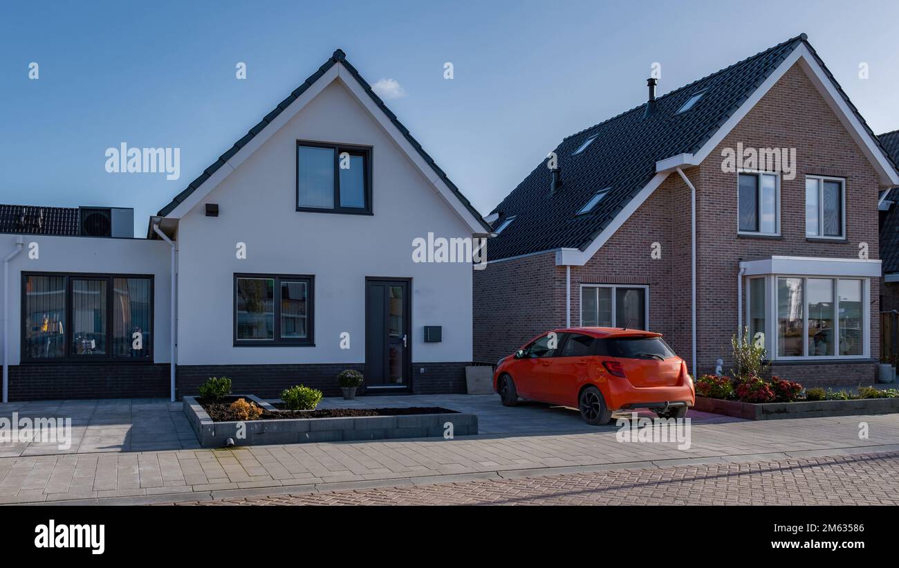 Dutch Suburban area with modern family houses, newly build modern ...