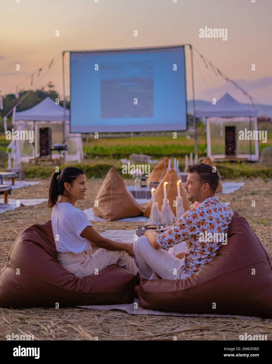 People Watching A Movie Outside