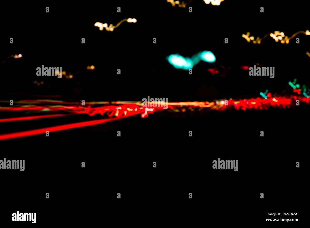 Lights of cars at night. Street line lights. Night highway city. Long ...