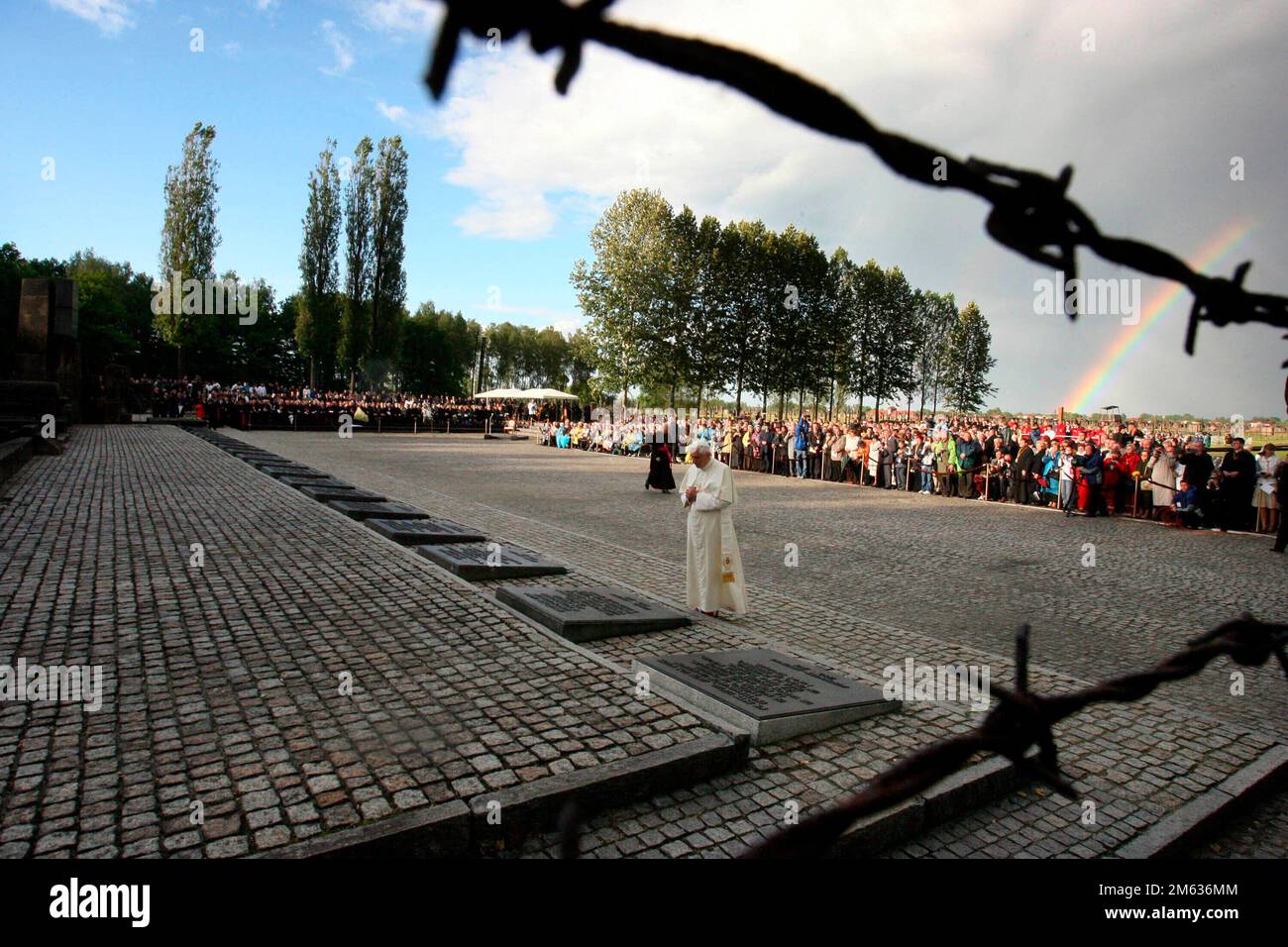 FILE - Pope Benedict XVI prays in front of the monument for the victims of the Auschwitz ...