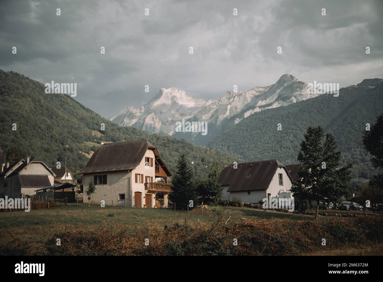 Grassy terrain houses under hi-res stock photography and images - Alamy