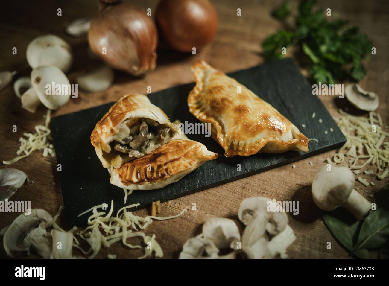From above of appetizing argentinian empanadas served on flat plate on ...