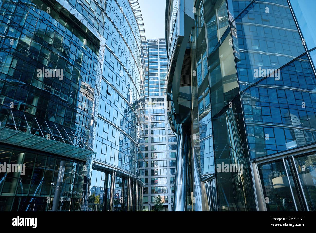 Detail of skyscraper office buildings with glass facades. Modern urban ...