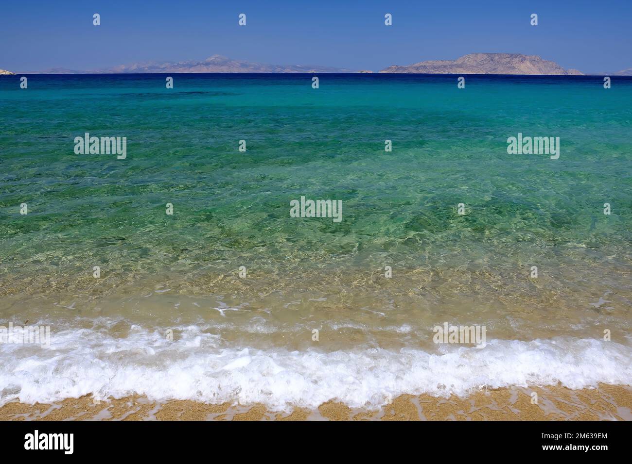 The amazing sandy and turquoise beach of Agia Theodoti In Ios Cyclades ...