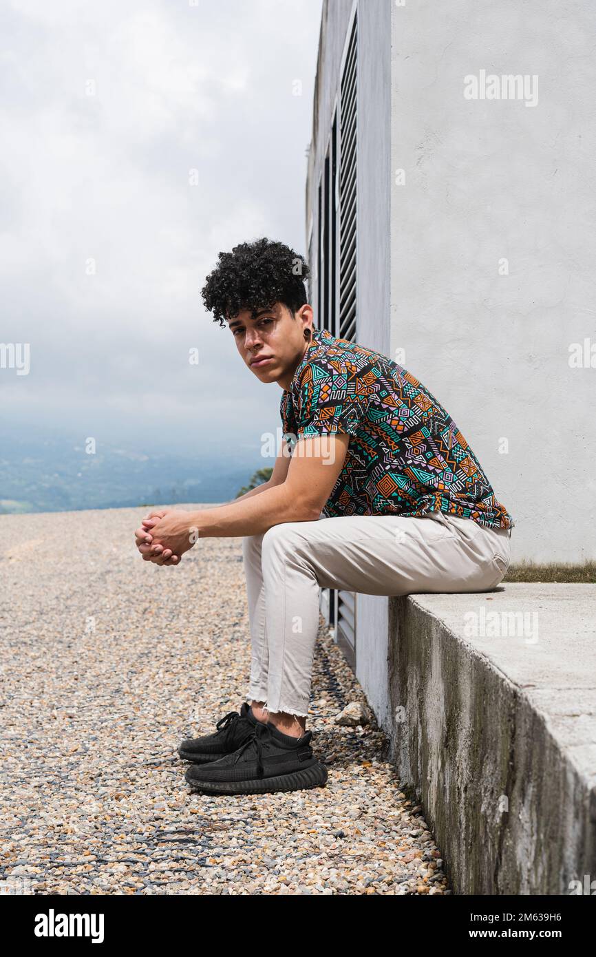 Full body side view of stylish Venezuelan male belonging to LGBT ...