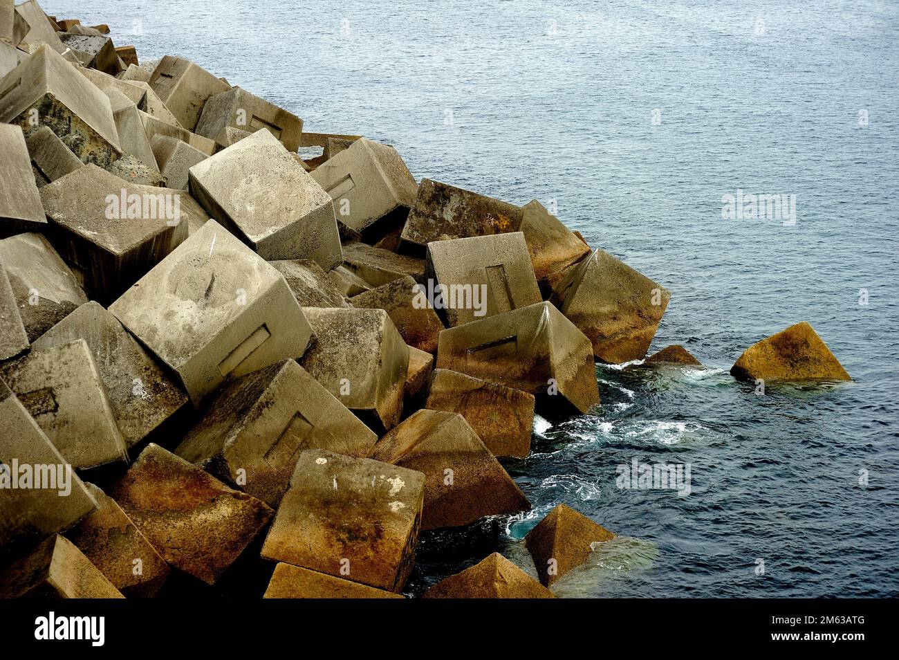 Concrete block is the breakwater at the Autonomous Port of Bilbao Stock ...