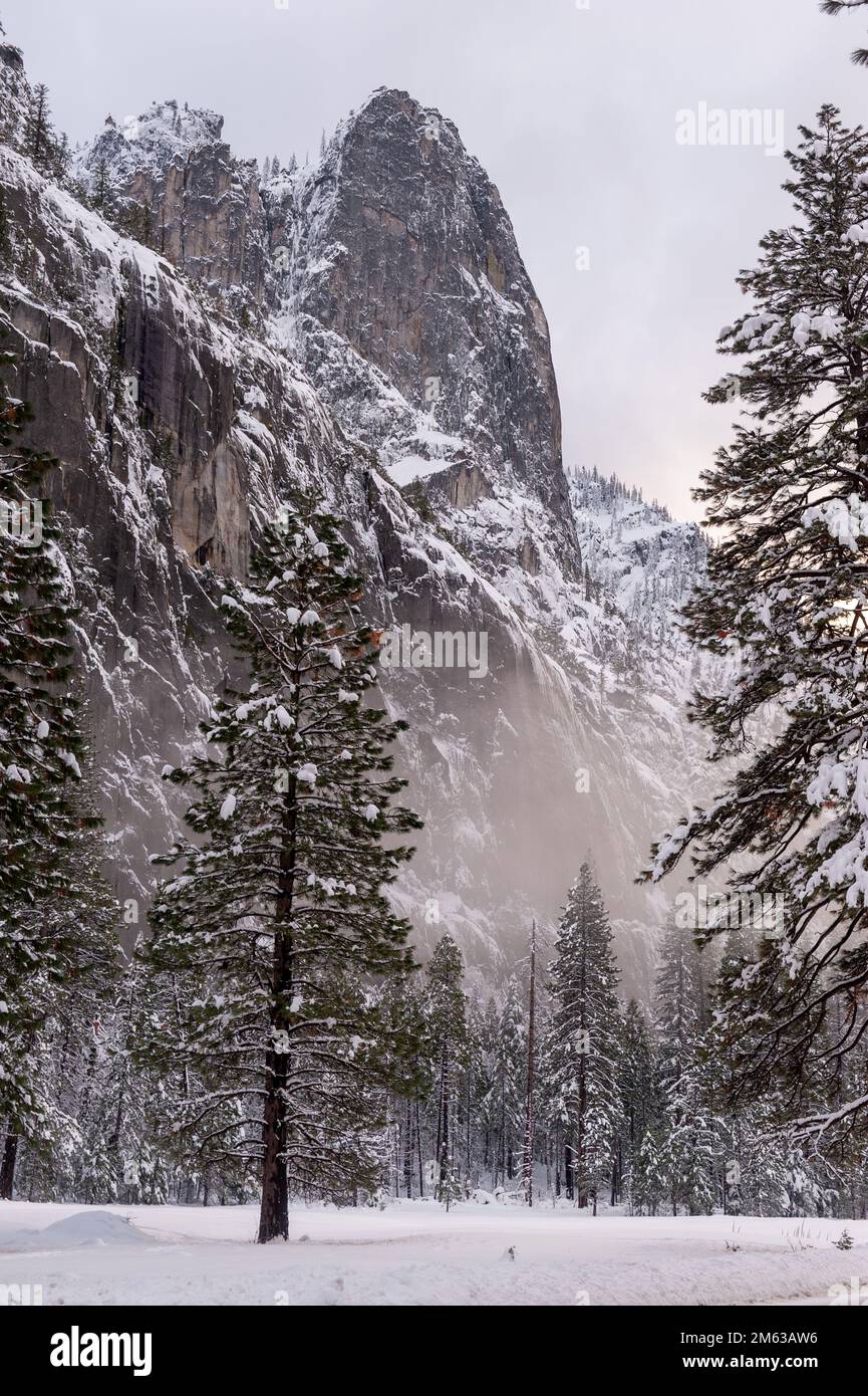 Exterior of a snow-covered landscape in Yosemite valley. It is late ...