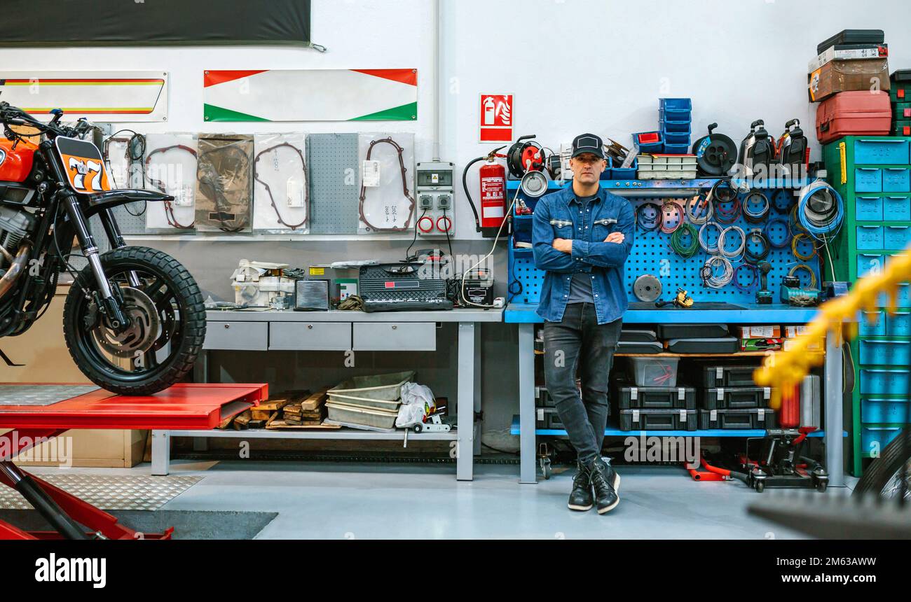 Male biker standing posing hi-res stock photography and images - Alamy