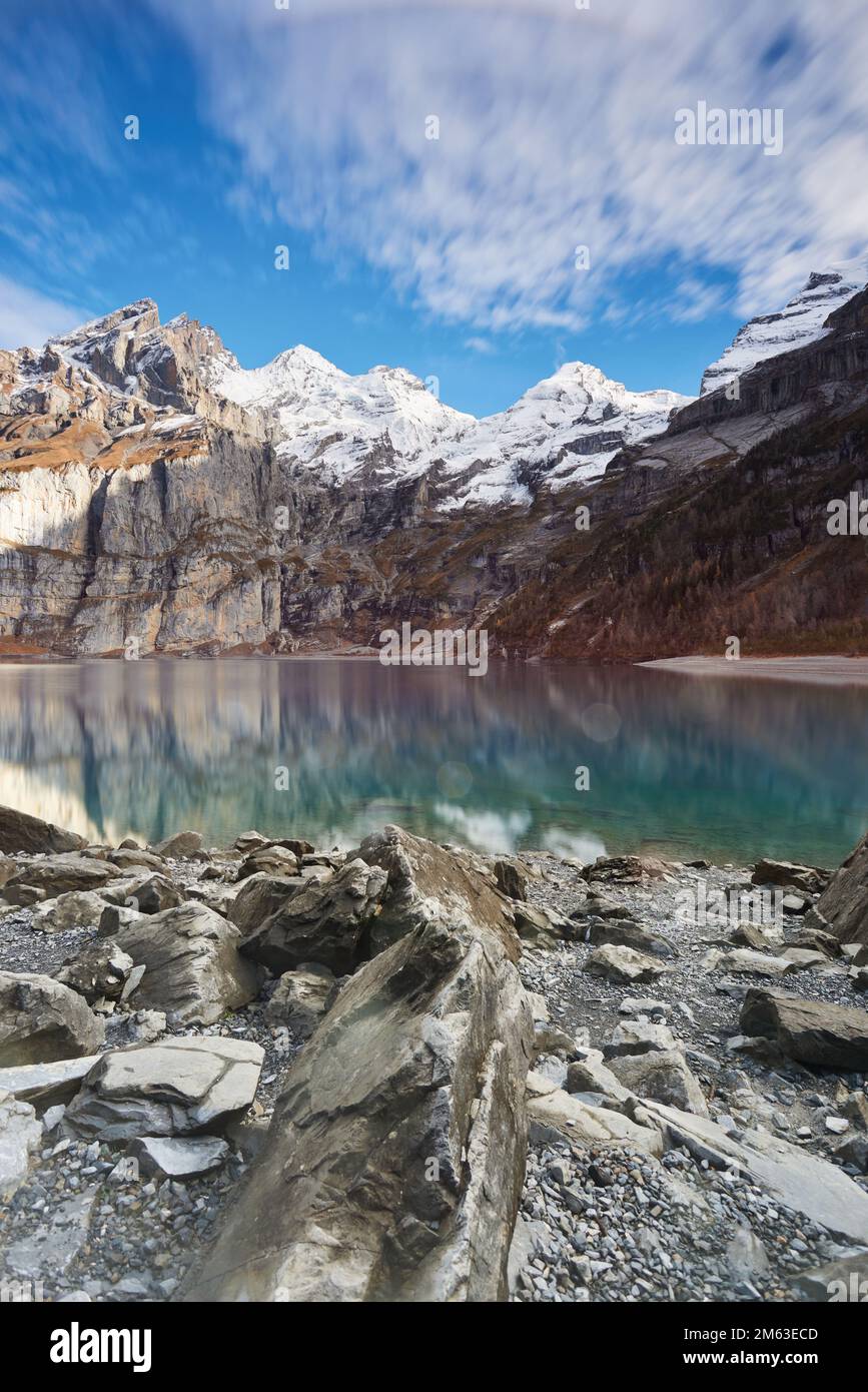 Amazing blue lake with large mountain in Schweiz Stock Photo - Alamy