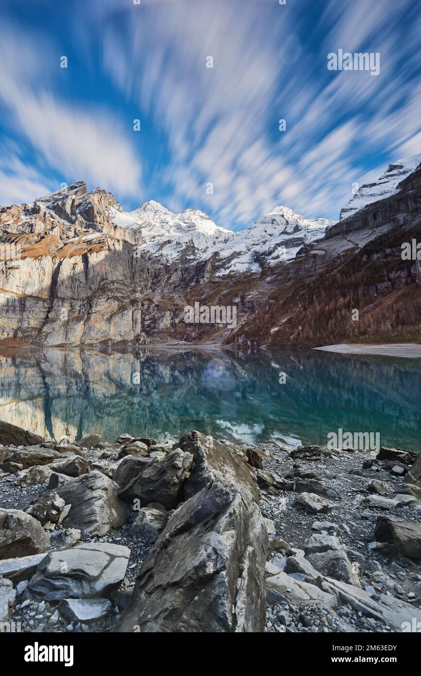 Amazing blue lake with large mountain in Schweiz Stock Photo - Alamy