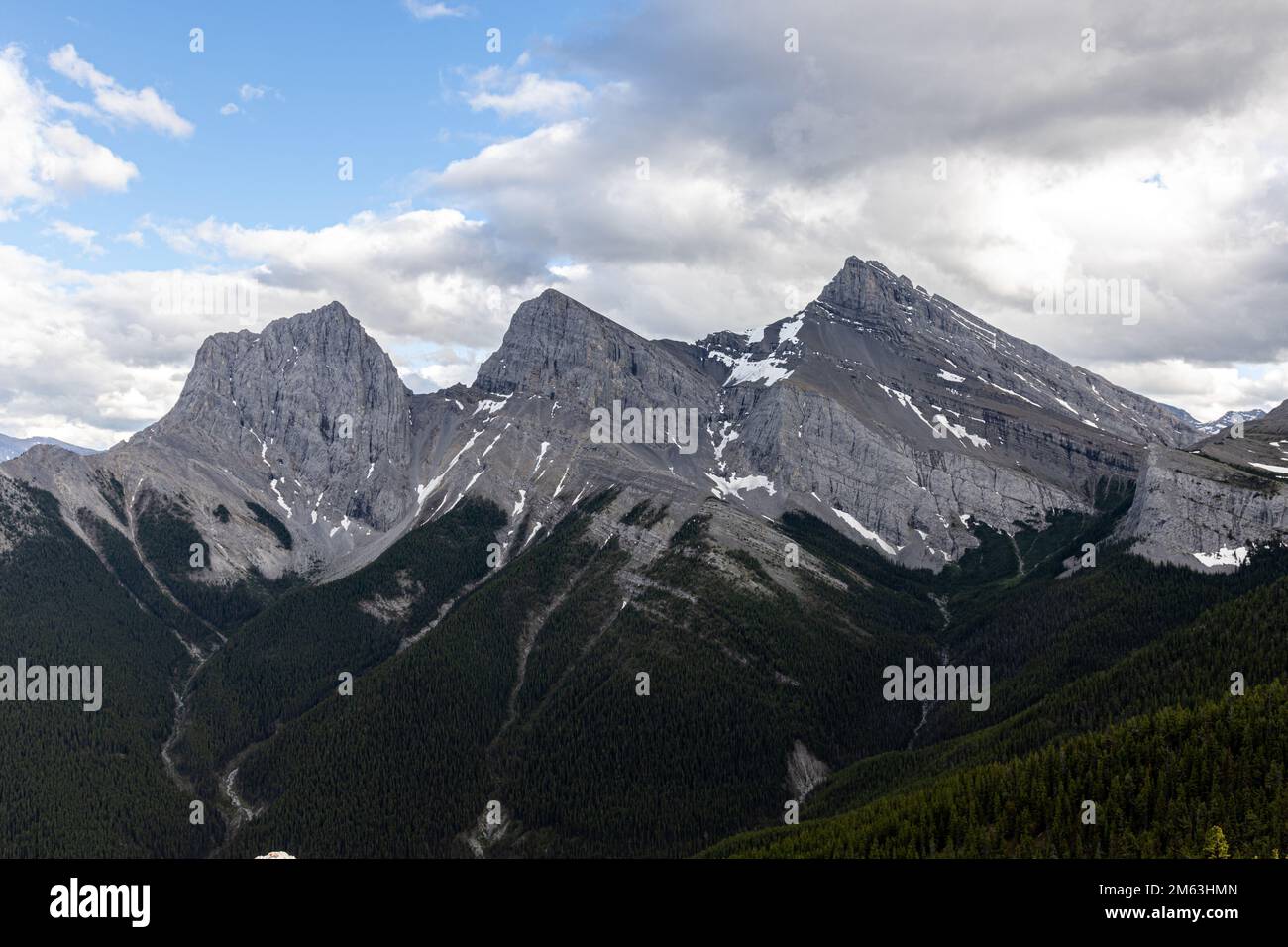 The Three Sisters trio of peaks in Canmore, Alberta, Canada Stock Photo ...