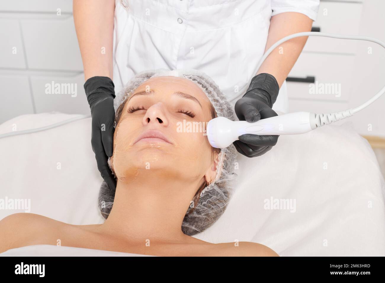 Cosmetologist makes RF lifting for rejuvenation woman face, anti aging ...