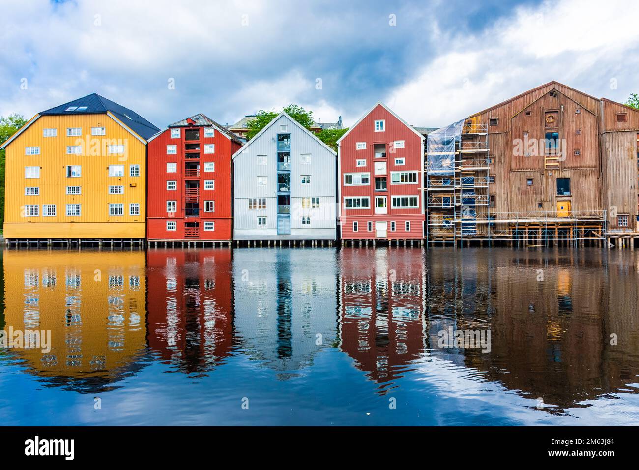 Beautiful view of the colorful wooden buildings of Trondheim Canal ...