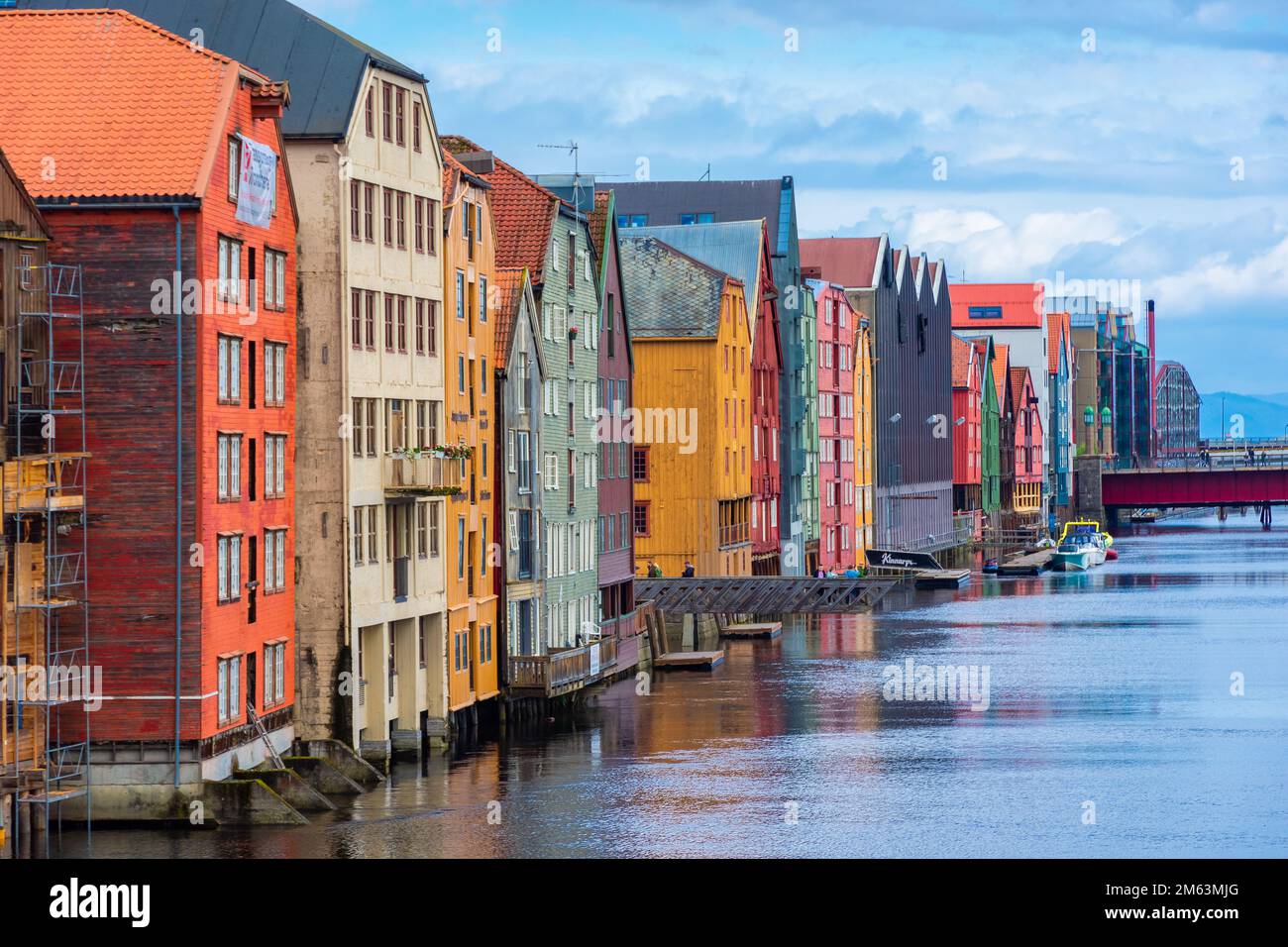 Beautiful view of the colorful wooden buildings of Trondheim Canal ...