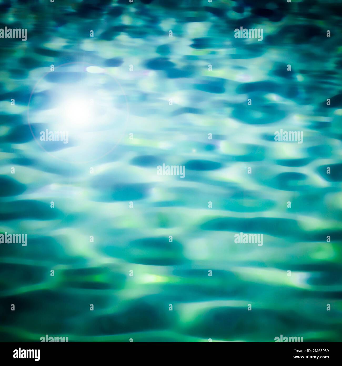 Surface of azure water in a swimming pool as a blurred abstraction ...