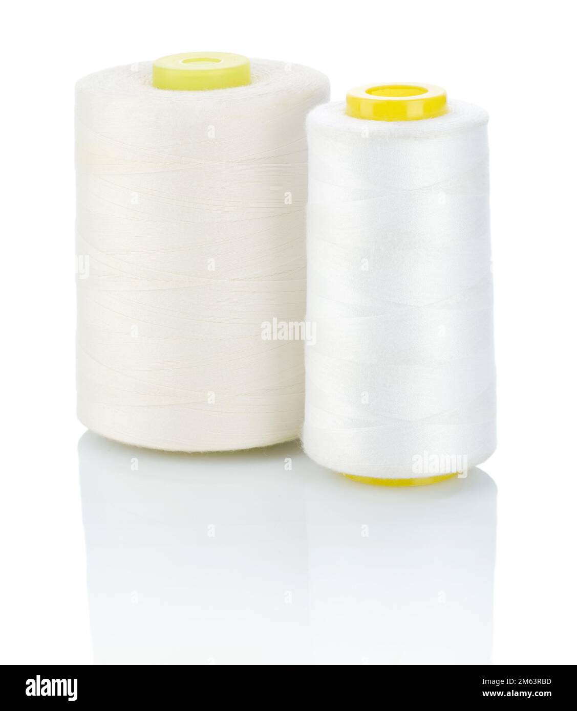 two spool of white thread Stock Photo - Alamy