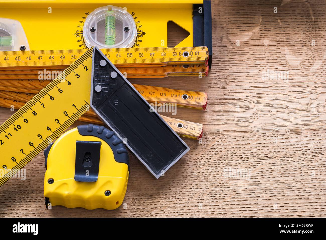 Wooden oaken board with objects of measurement construction concept ...