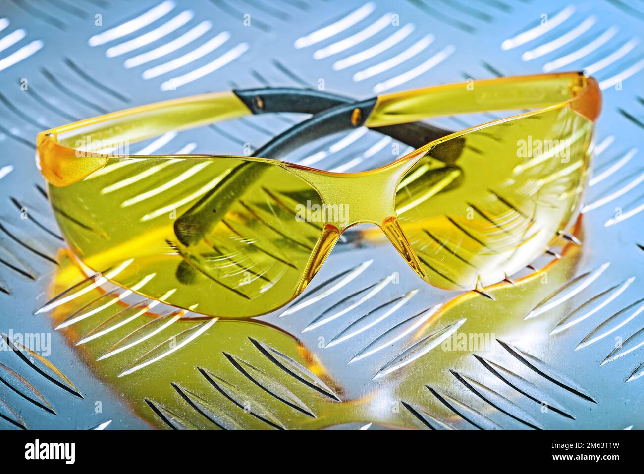 yellow goggles on corrugated metalic sheet Stock Photo - Alamy