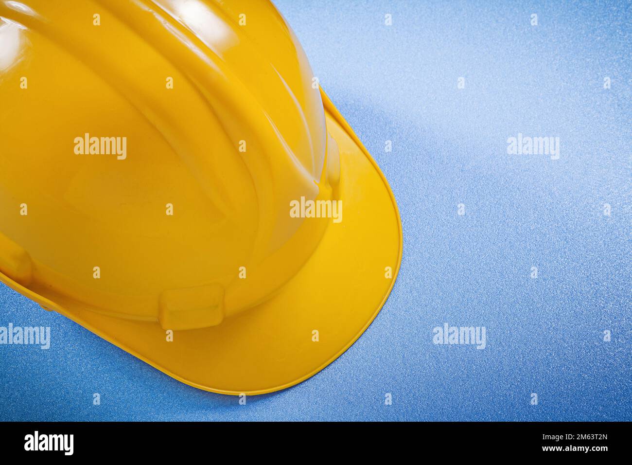 Yellow hard hat blue hi-res stock photography and images - Alamy