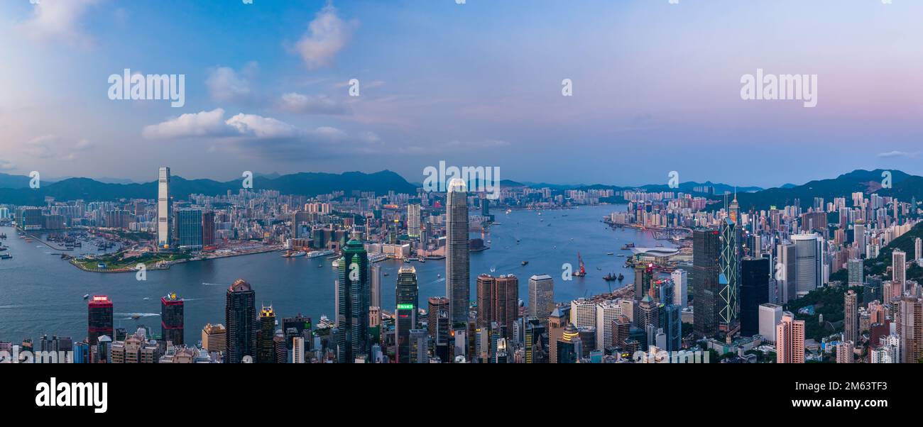 Panorama of Hong Kong Island, Victoria Harbour and Kowloon at dusk ...