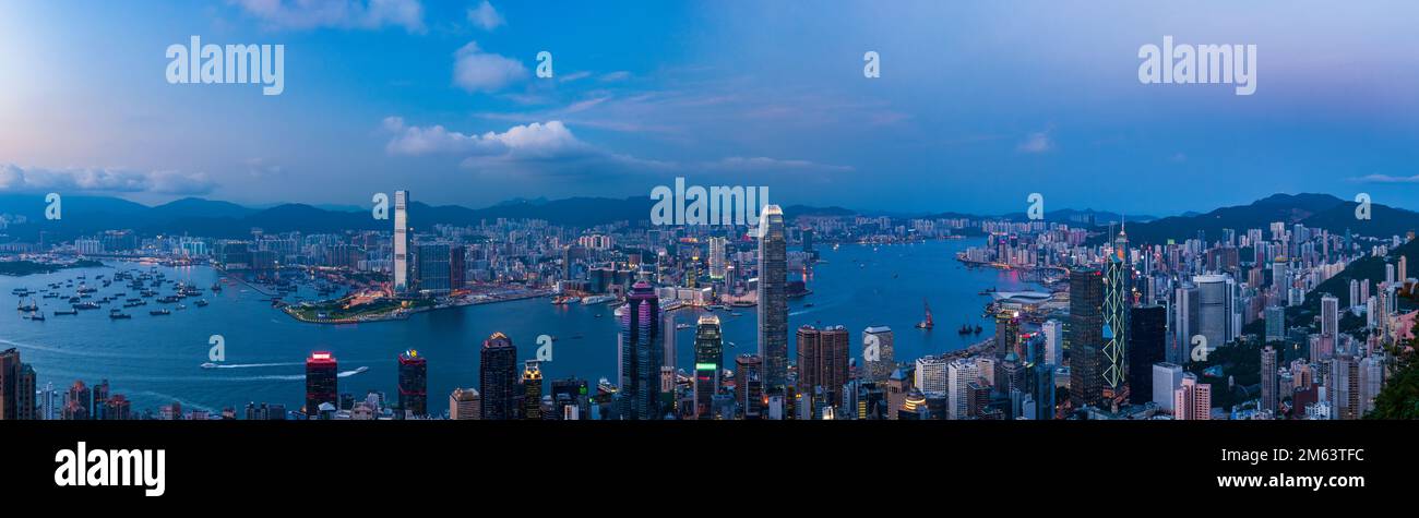 Panorama of Hong Kong Island, Victoria Harbour and Kowloon at dusk ...