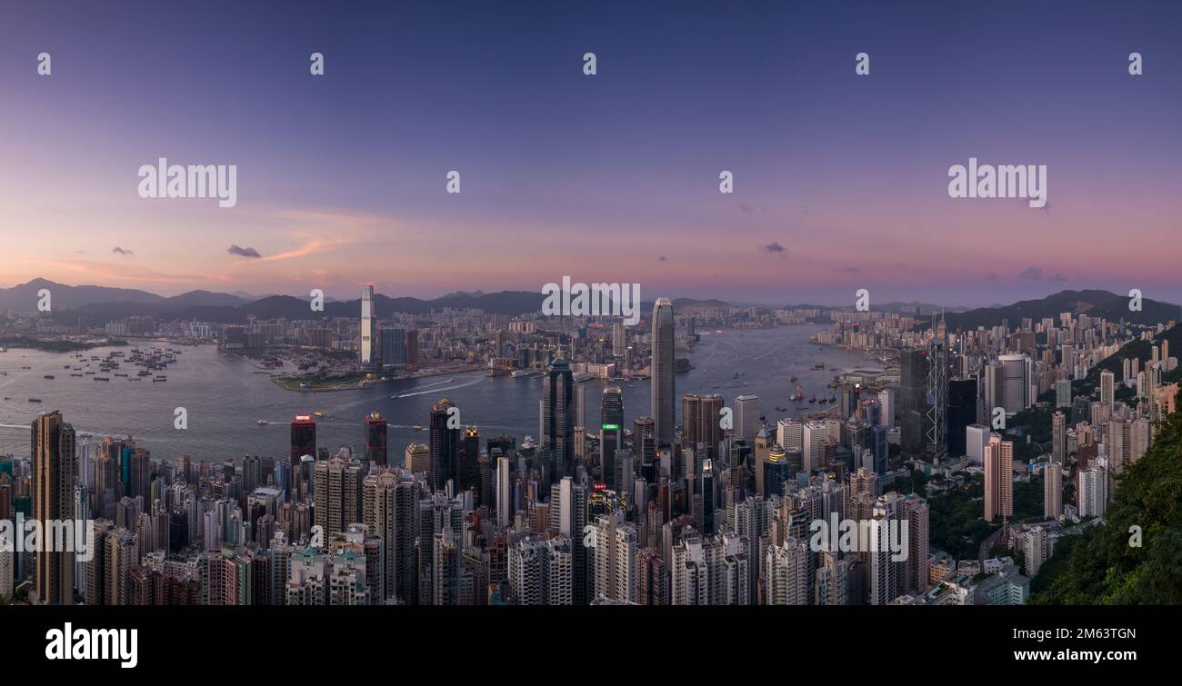Panorama of Hong Kong Island, Victoria Harbour and Kowloon at dusk ...