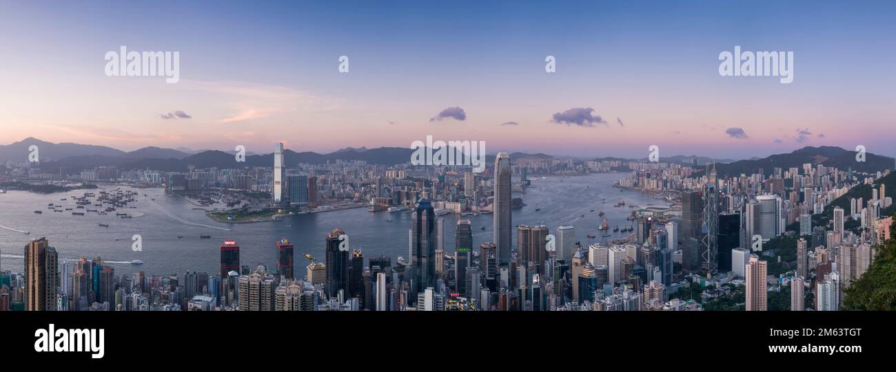Panorama of Hong Kong Island, Victoria Harbour and Kowloon at dusk ...