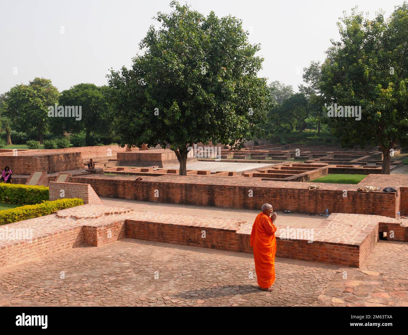 MONK CIRCUMAMBULATING IN PRAYER AROUND THE GANDHAKUTI, JETAVAN ...