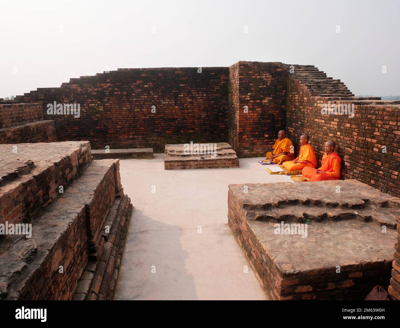 MONKS MEDITATING CHANTING AT THE MIRACLE STUPA, SHRAVASTI, UTTAR ...
