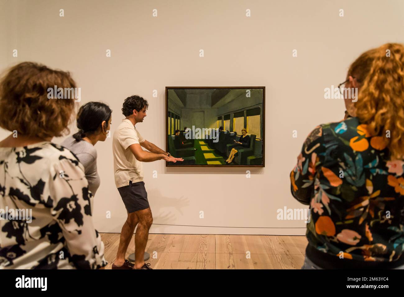 Curator explaining the painting Chair Car, 1965, Edward Hopper's New ...