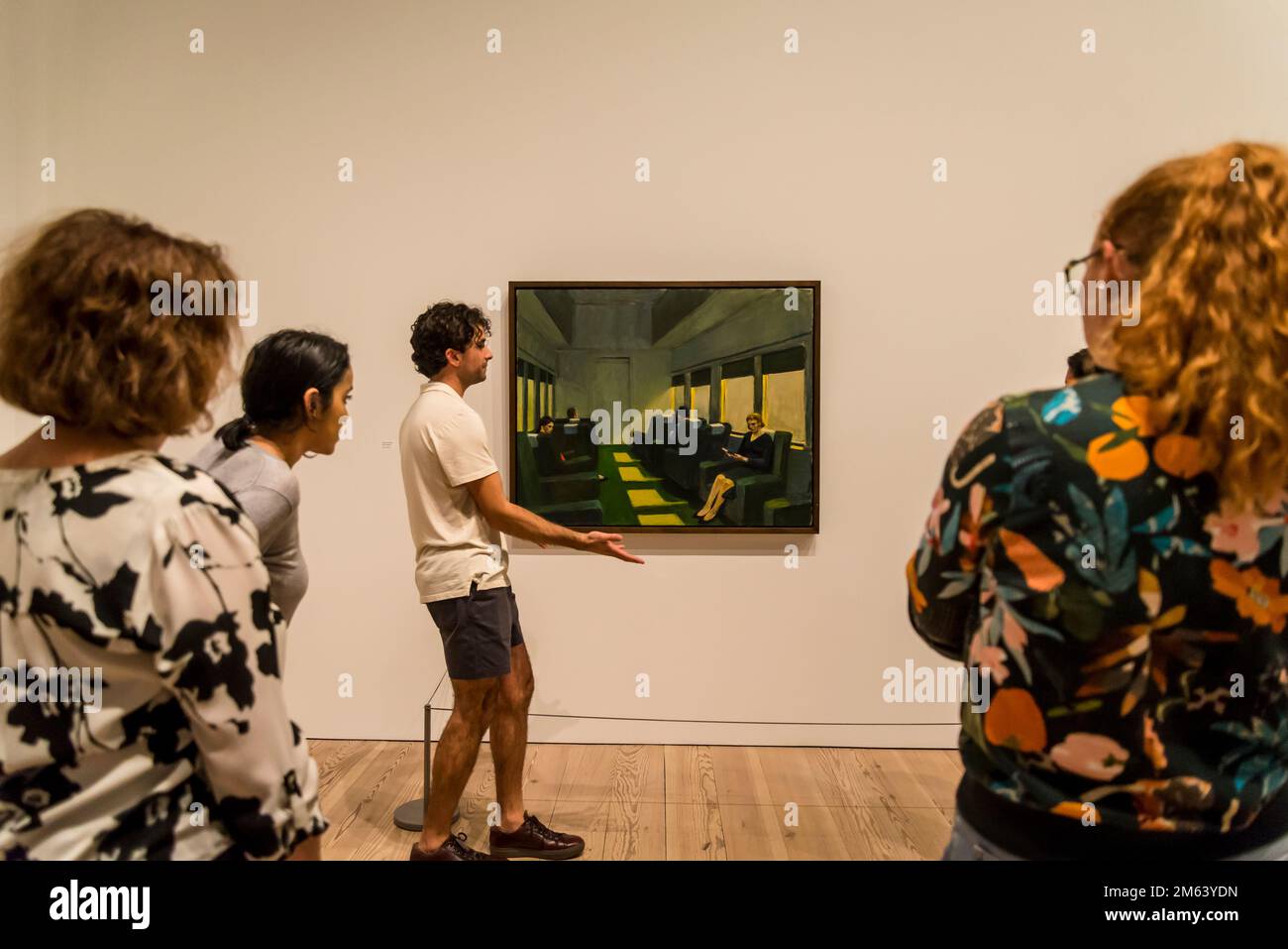 Curator explaining the painting Chair Car, 1965, Edward Hopper's New ...