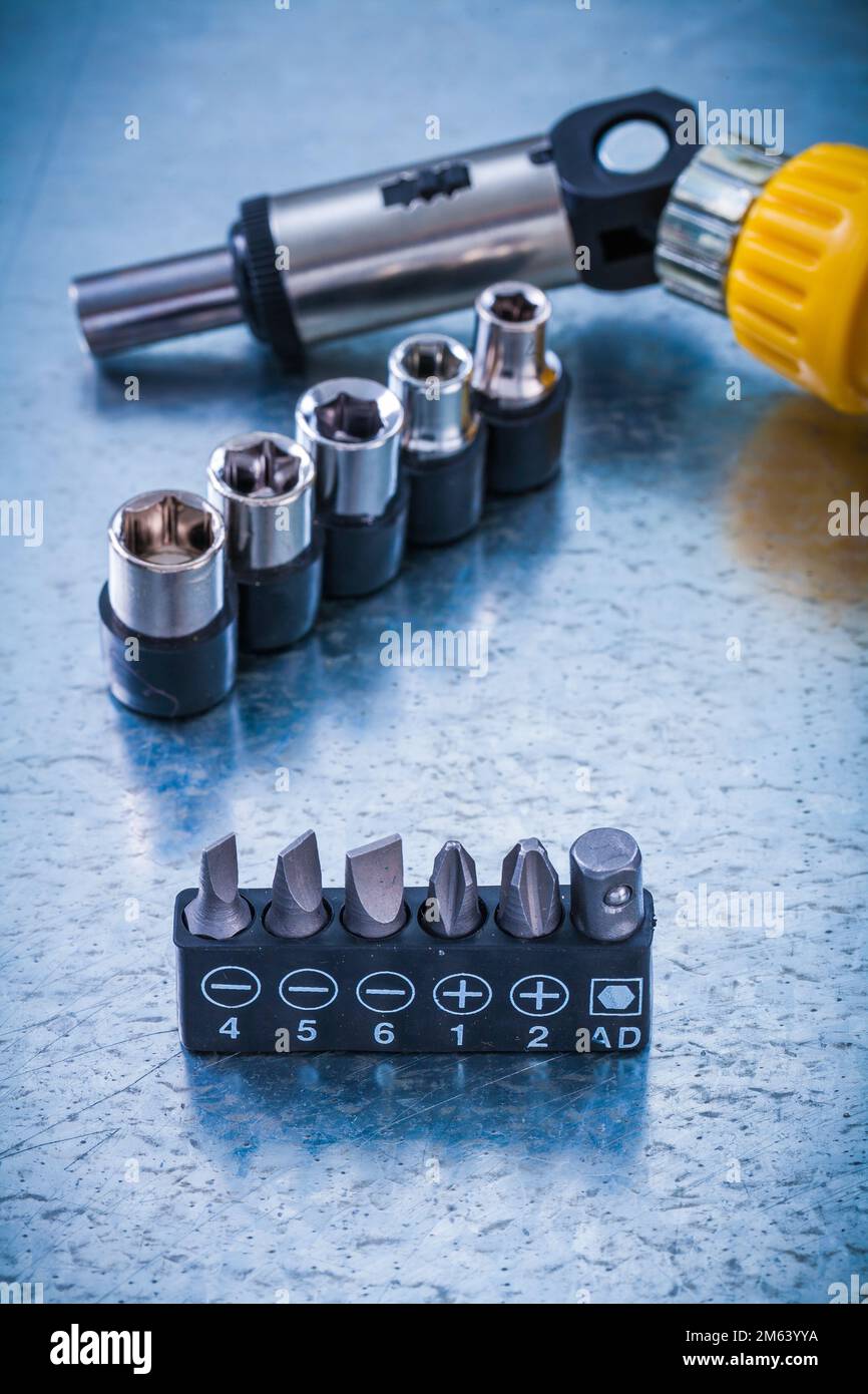 Close up image of reversible screwdriver screw bits and torxes on ...
