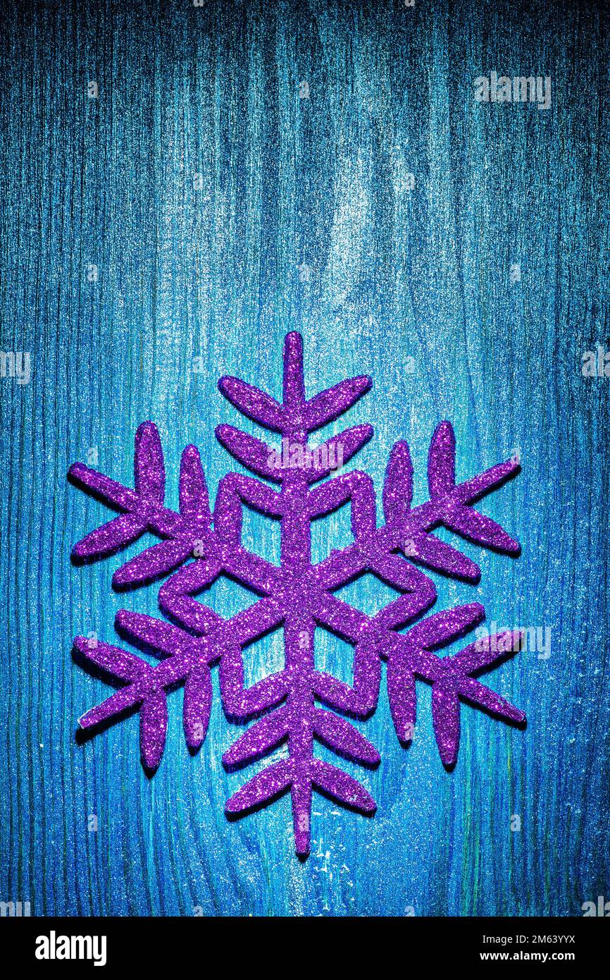 christmas toys simbol flake on blue background Stock Photo - Alamy