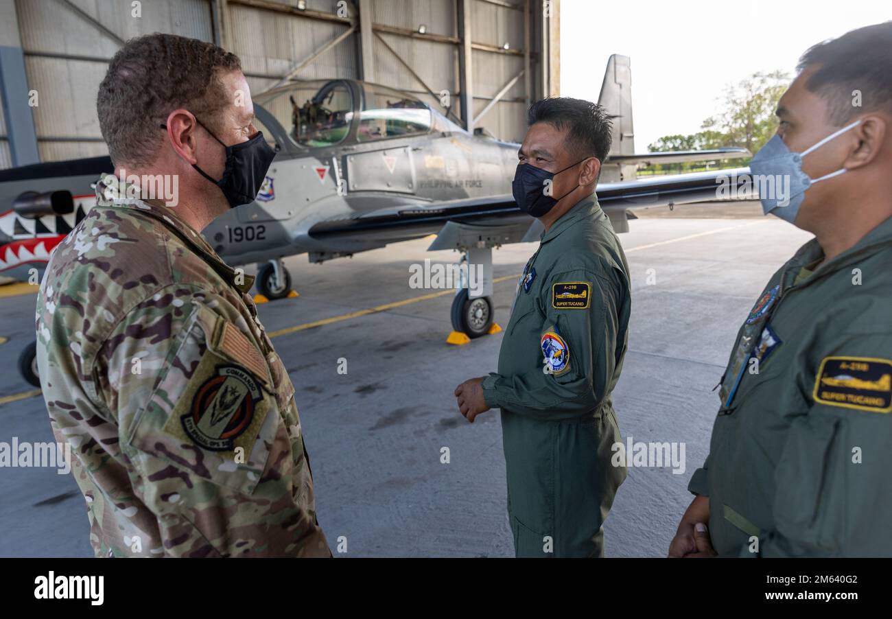 U.S. and Philippine Air Force maintainers discuss maintenance ...