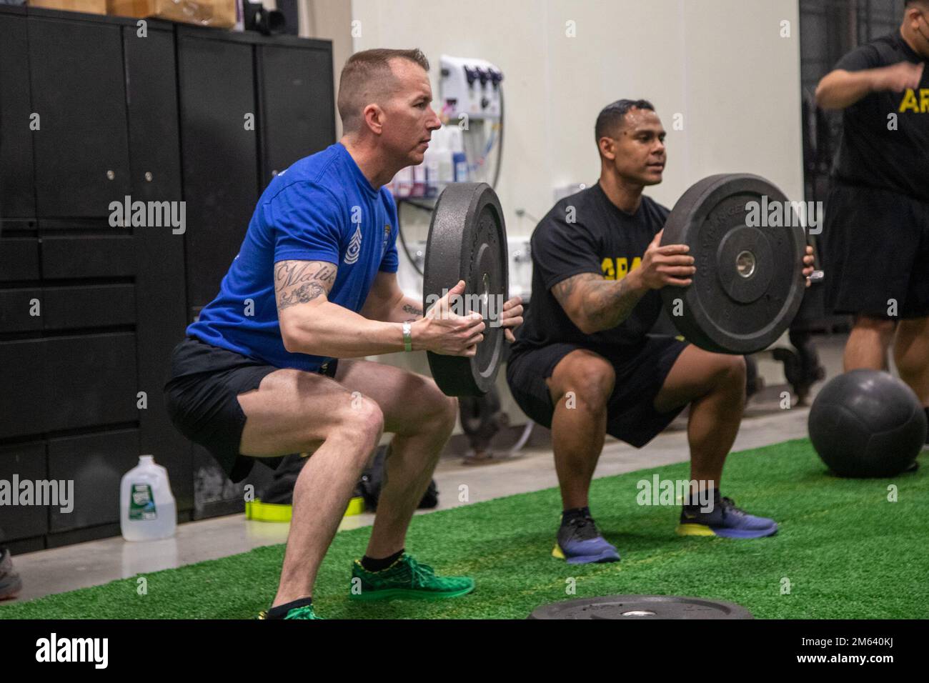 Sgt. Maj. Matthew J. Welker, left, chief culinary management sergeant ...