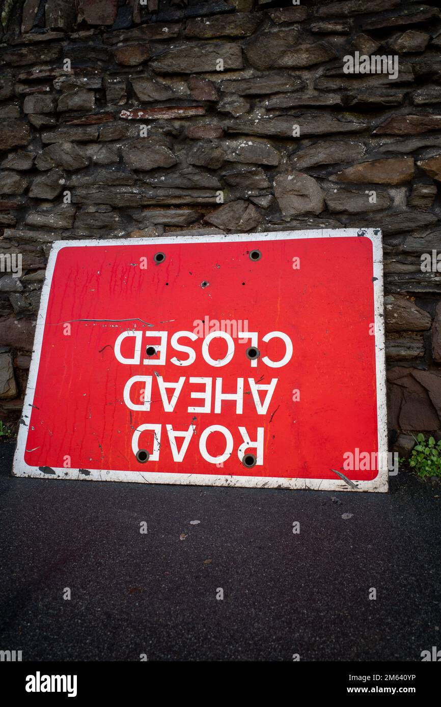 Upside down Road Ahead Closed sign Stock Photo - Alamy